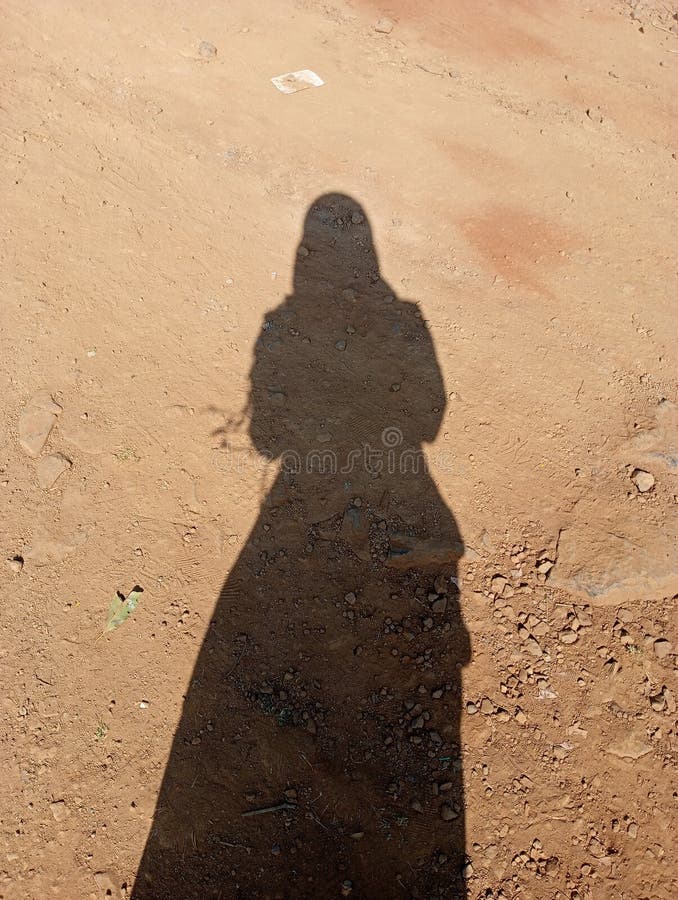 Shadow of a girl in neqab stock image. Image of wall - 239905669