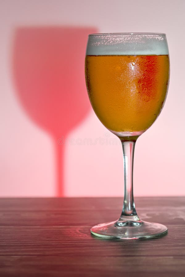 Shadow of Beer Bottle on Warm Sand. Textured Image with Footprints on ...