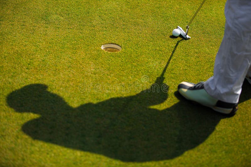 Shadow of Golfer that is Going To Putt Stock Image - Image of golf ...