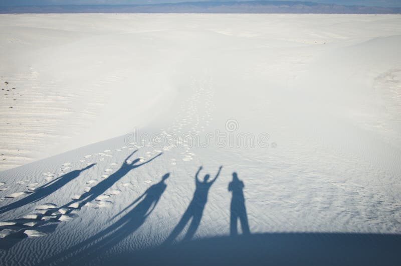 The Shadow of a Group of People on White Sand Dunes Stock Image - Image ...