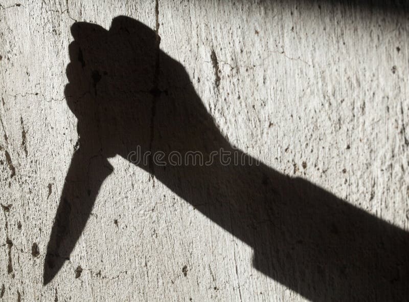 Shadow of the Hand Holding a Knife Stock Photo - Image of manslaughter ...
