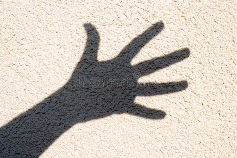 Shadow of a Hand on a Light Wall. Stock Photo - Image of lightlighting ...