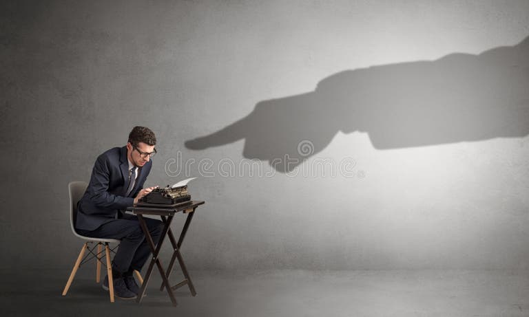 Shadow Hands Pointing at a Small Worker Stock Photo - Image of blogger ...