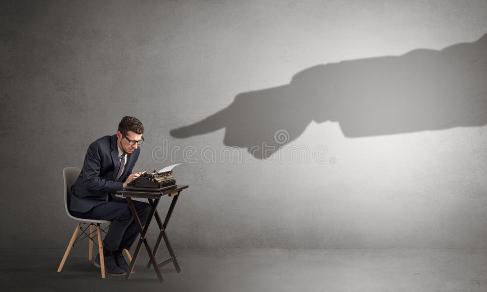 Shadow Hands Pointing at a Small Worker Stock Photo - Image of blogger ...