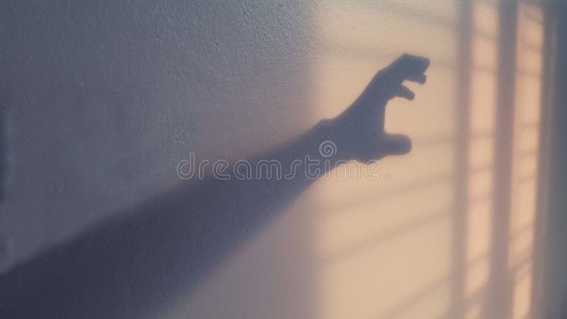 Shadow of hand reach out stock photo. Image of light - 145528118