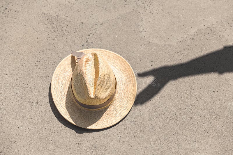 Shadow of Hand Touching Real Straw Hat Stock Image - Image of wall ...