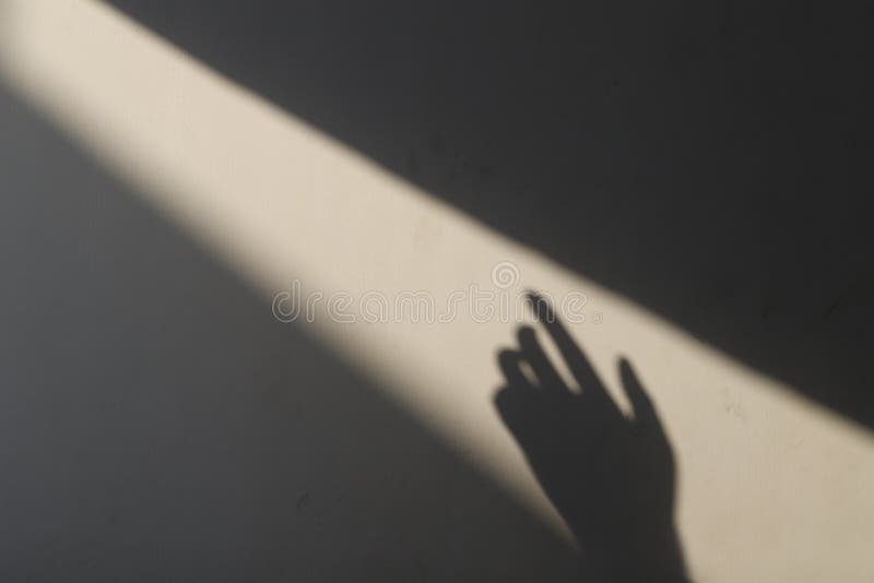 Shadow of a Hand on a Wall. Stock Photo - Image of text, black: 196527380