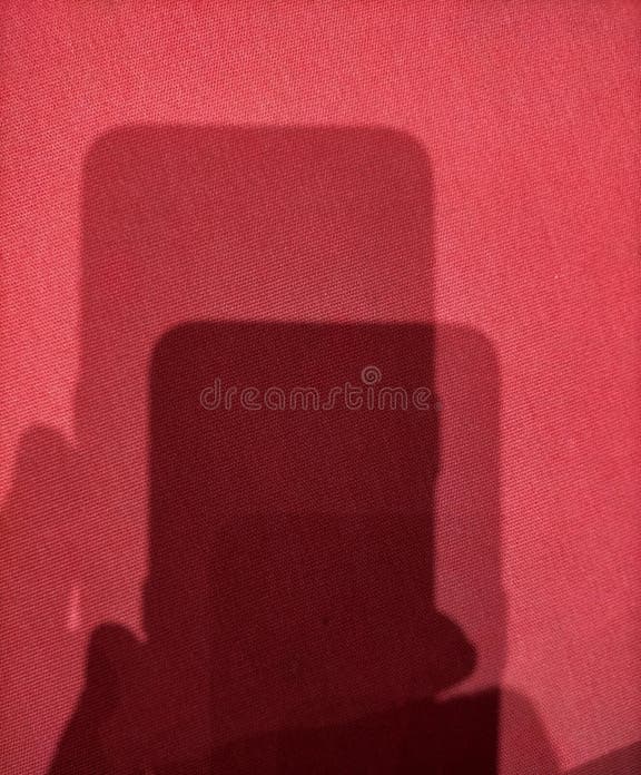 The Shadow of Handphone and Hand on Red Background Stock Photo - Image ...