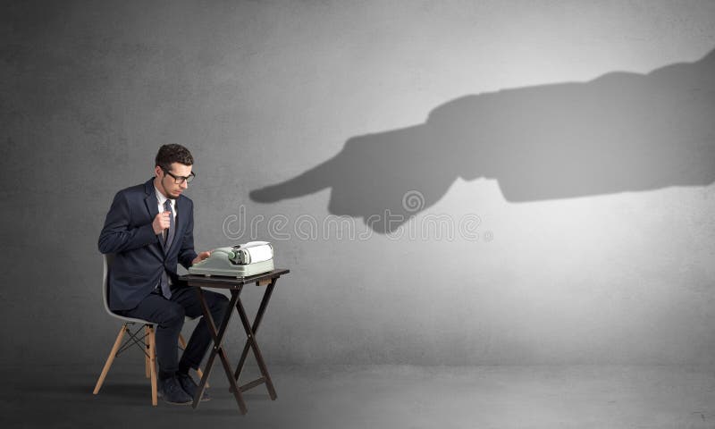 Shadow Hands Pointing at a Small Worker Stock Photo - Image of ...