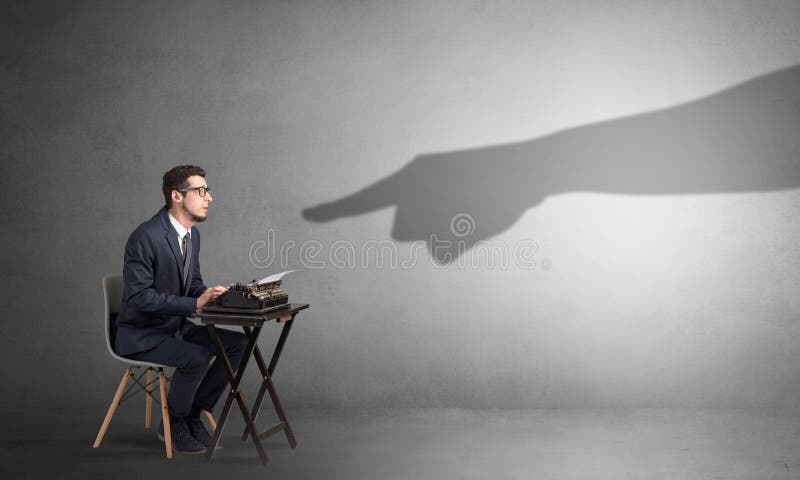 Shadow Hands Pointing at a Small Worker Stock Photo - Image of article ...