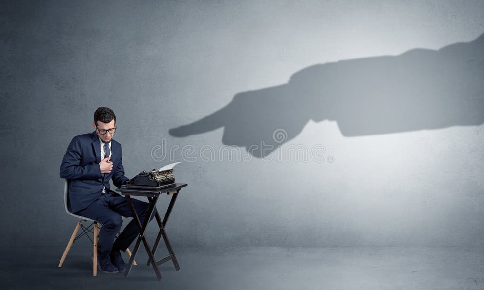 Shadow Hands Pointing at a Small Worker Stock Photo - Image of boss ...