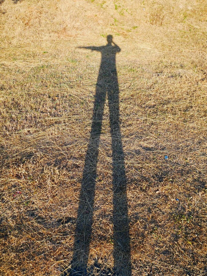 Shadow Human on the Dry Grass Stock Photo - Image of photographer ...