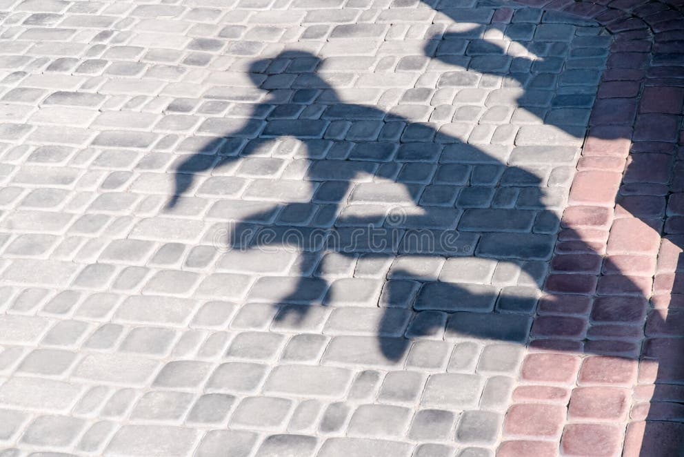 Shadow jumping man stock image. Image of shadow, people - 76301147