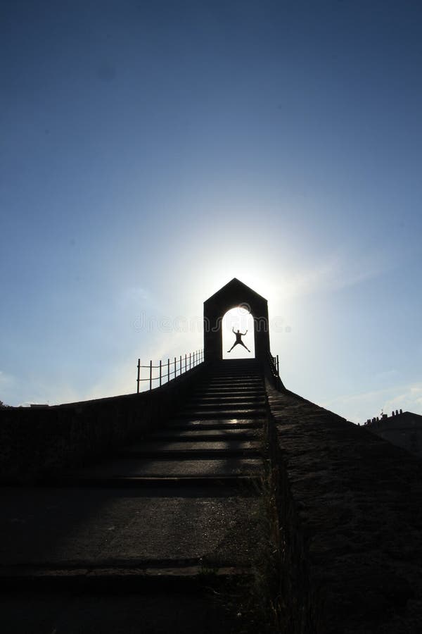 Shadow of a jumping man stock image. Image of sport - 231100805