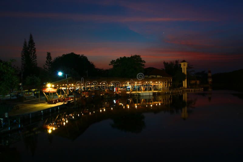 Shadow on the lake light stock image. Image of sunset - 224000929