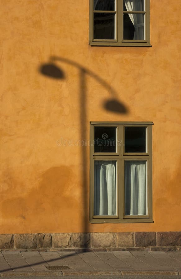 Shadow of a lamp post stock image. Image of town, sweden - 6977715