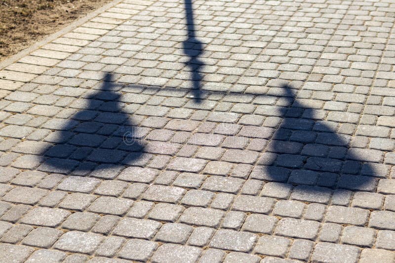Shadow of the Lamp Post Cast on the Pavement. Outdoors Stock ...