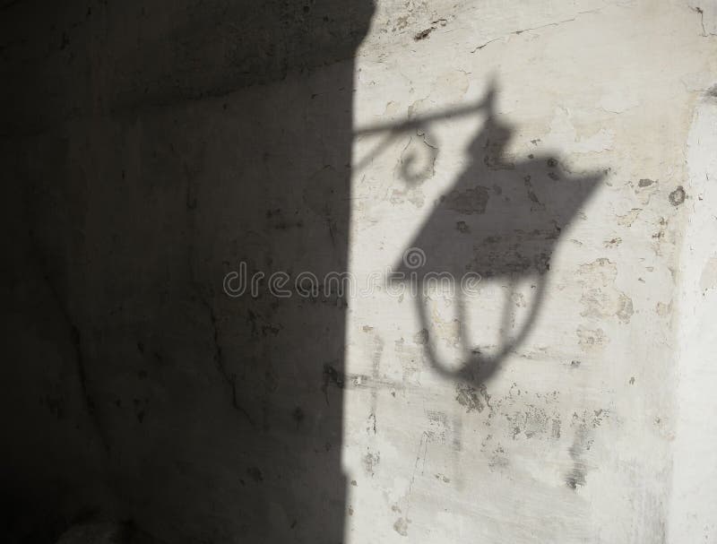 Shadow of a Lantern on a Gray Painted Wall in the Streets of Polignano ...