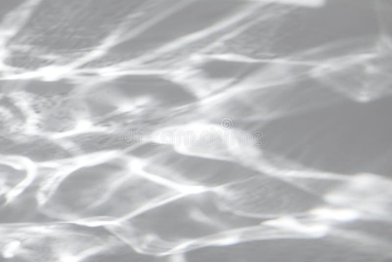 Shadow and Light Caustic Effect on a White Wall Stock Photo - Image of ...