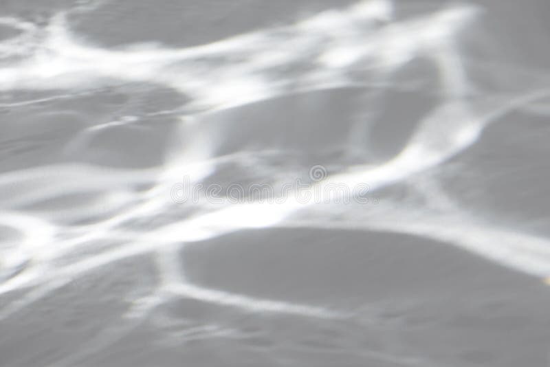 Shadow and Light Caustic Effect on a White Wall Stock Image - Image of ...