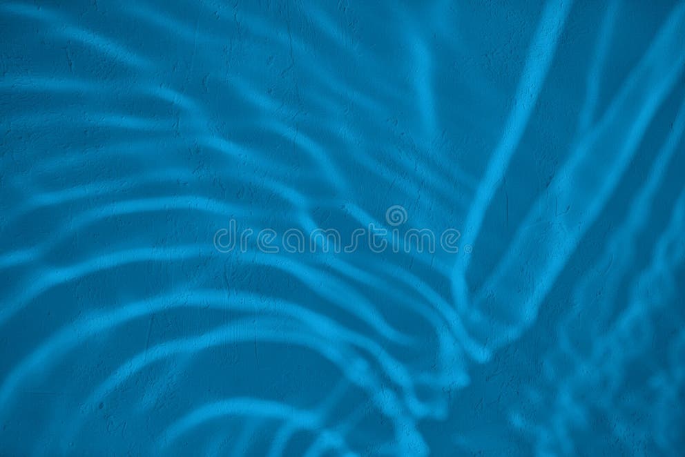 Shadow and Light Water Caustic Effect on Blue Concrete Wall Stock Photo ...