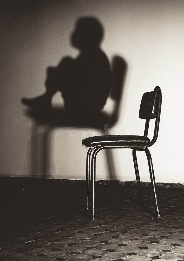 Shadow of a Little Boy Sitting on a Chair and Being Lonely Stock Photo ...