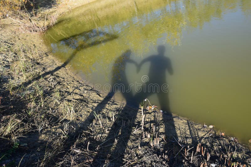 Shadow of love stock photo. Image of shadows, silhouettes - 1137152