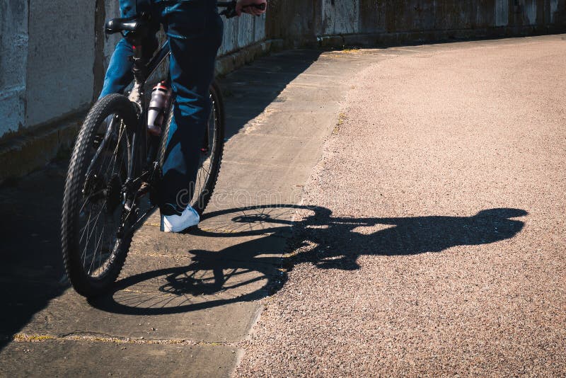 Shadow of a Man on a Bicycle with Copy Space Stock Photo - Image of ...