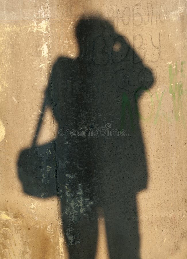 Shadow of the Photographer on the Wall Stock Image - Image of person ...