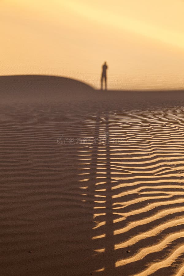 Shadow of a Man in the Desert Stock Image - Image of outdoor, sand ...