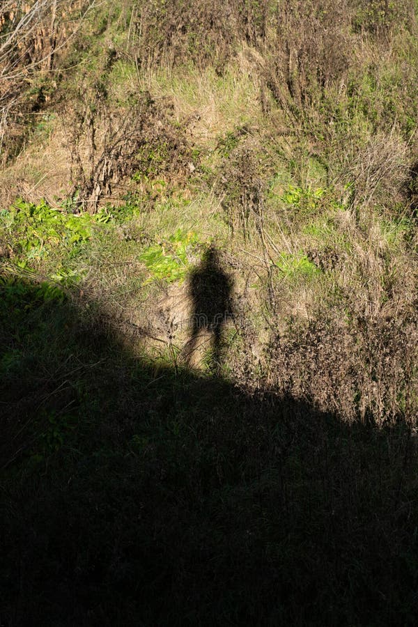 The Shadow of a Man in the Distance Looking Down. the Shadow of a Man ...