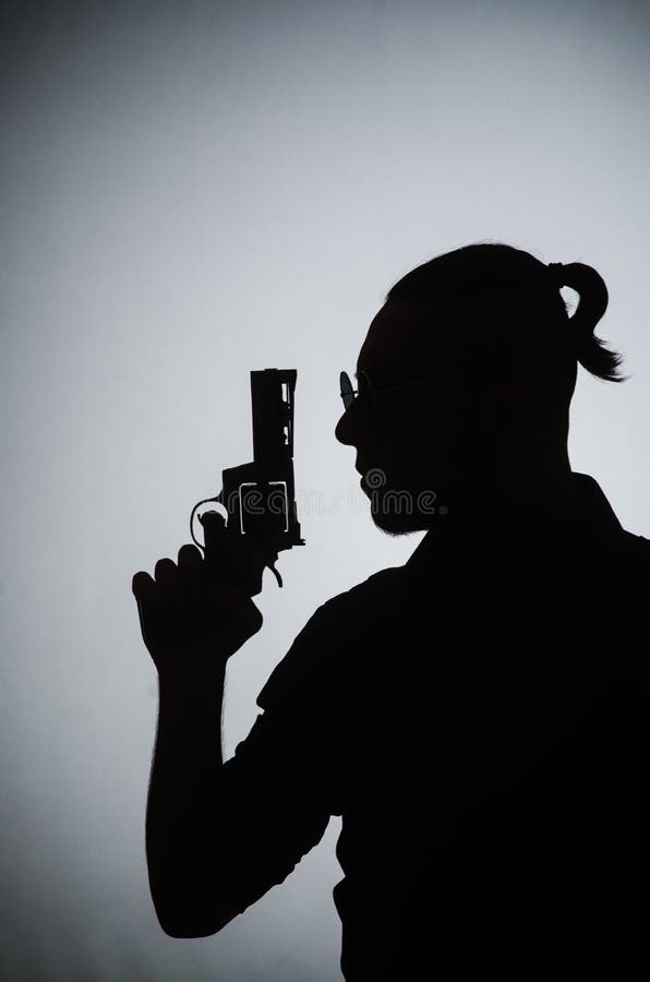 The Shadow of the Man with Gun Stock Photo - Image of mafia, hijacker ...