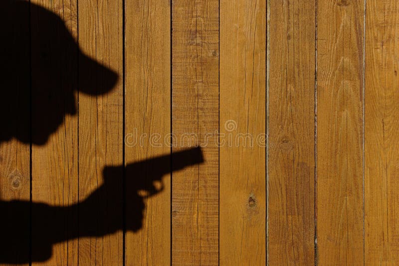 Shadow of a Man with a Gun on a Wooden Fence Stock Image - Image of ...