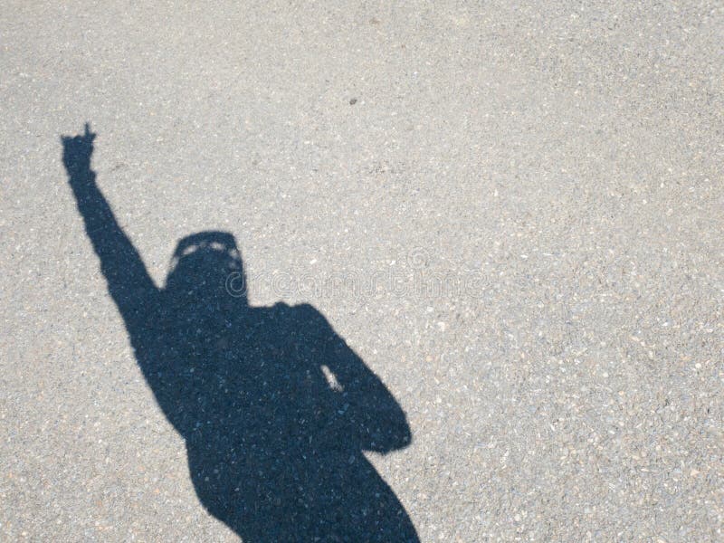 Shadow of a Man with His Arm Up Waving Stock Photo - Image of drawn ...