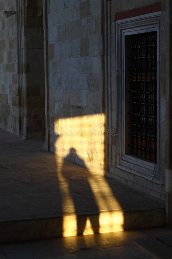 Man Behind the Shadows stock photo. Image of modern - 122388086