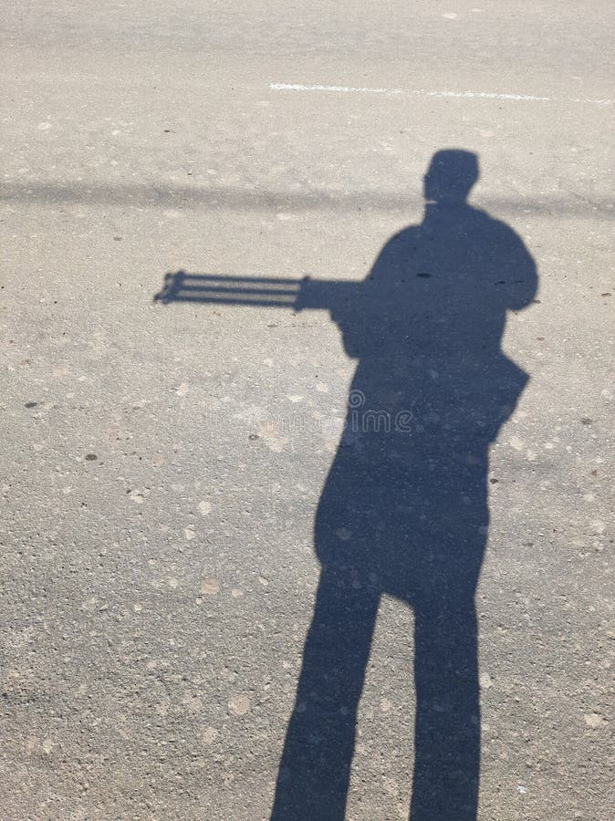 Shadow of a Man with a Machine Gun Turret Stock Image - Image of ...