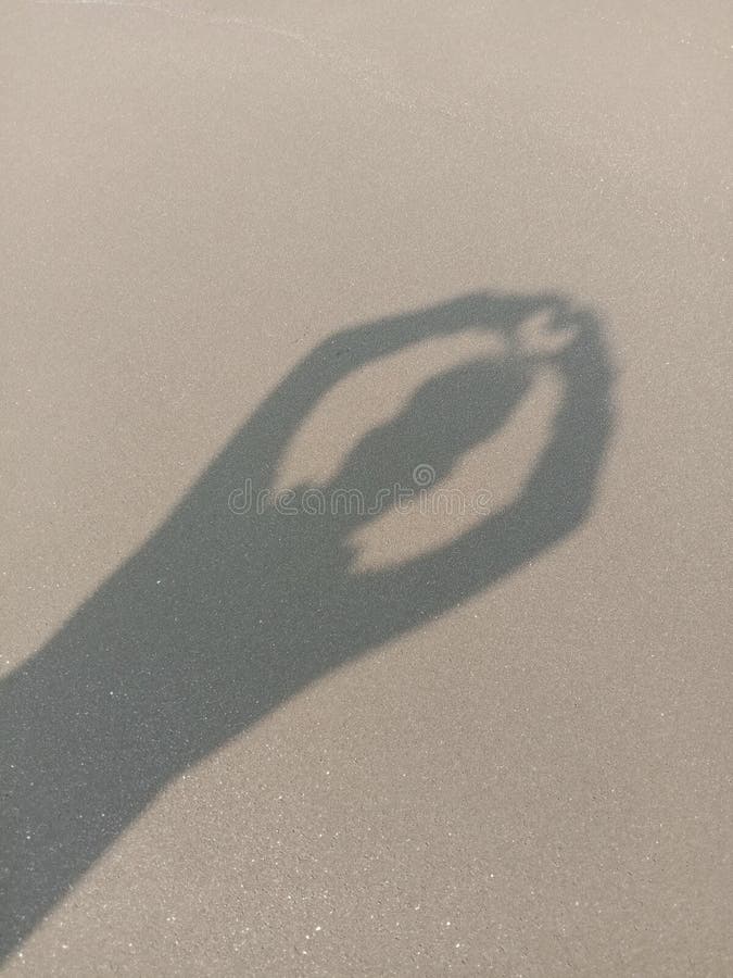 Shadow of a Man Making a Love Sign Stock Image - Image of brown, love ...