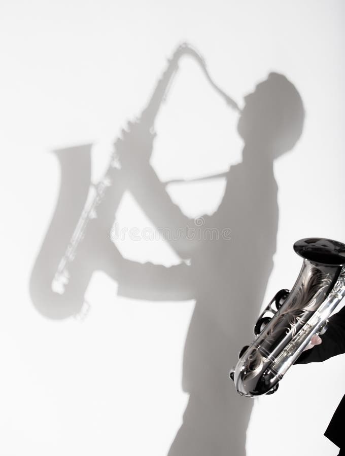 424 Man Playing Saxophone Silhouette Photos - Free & Royalty-Free Stock ...