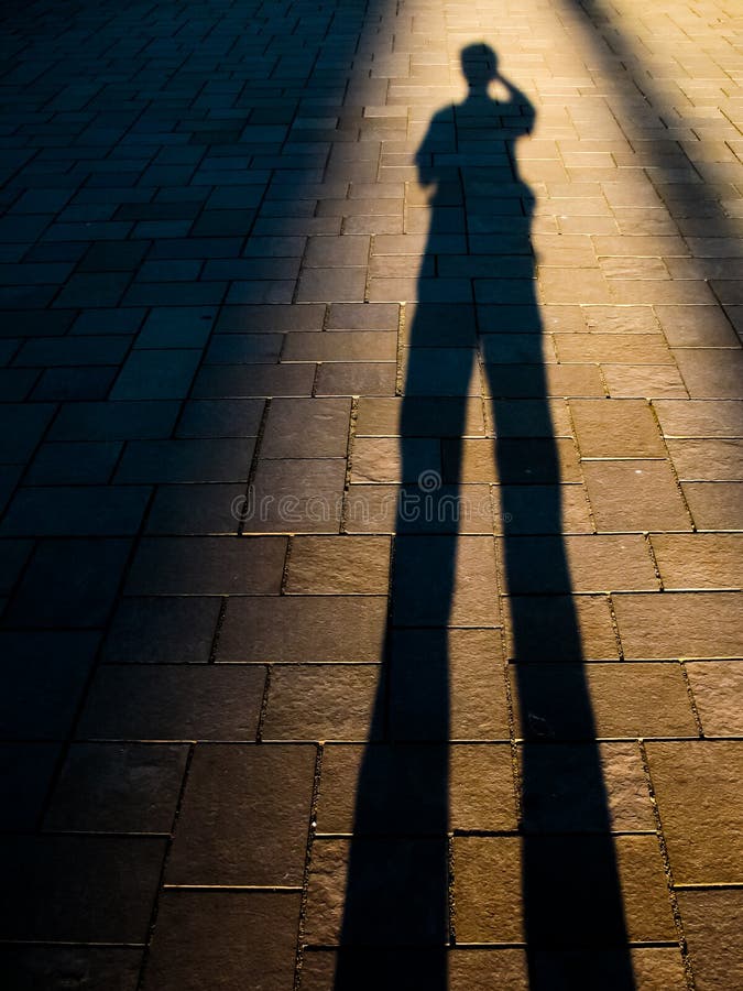 Shadow of a man stock photo. Image of sunlight, figure - 34573882