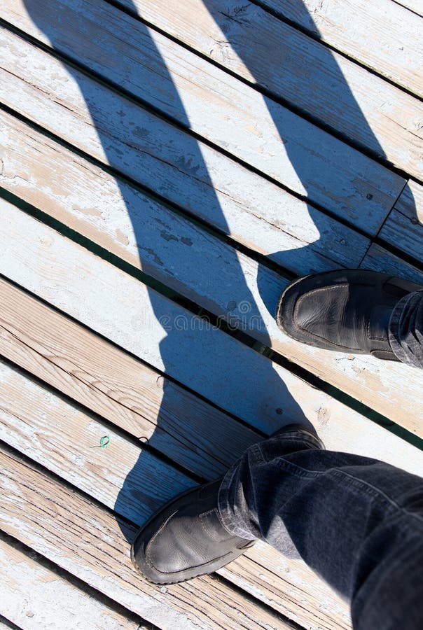 Shadow of a Man S Feet on a Wooden Floor Stock Photo - Image of vintage ...