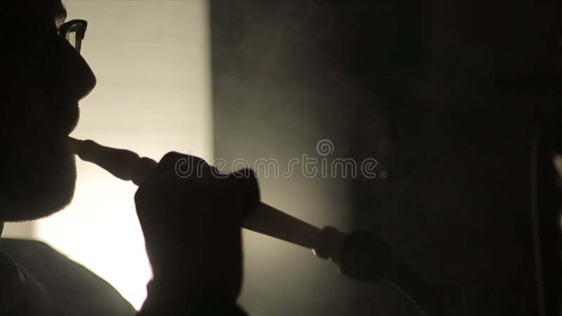 Shadow of a Man Smoking a Hookah Stock Video - Video of lebanese ...