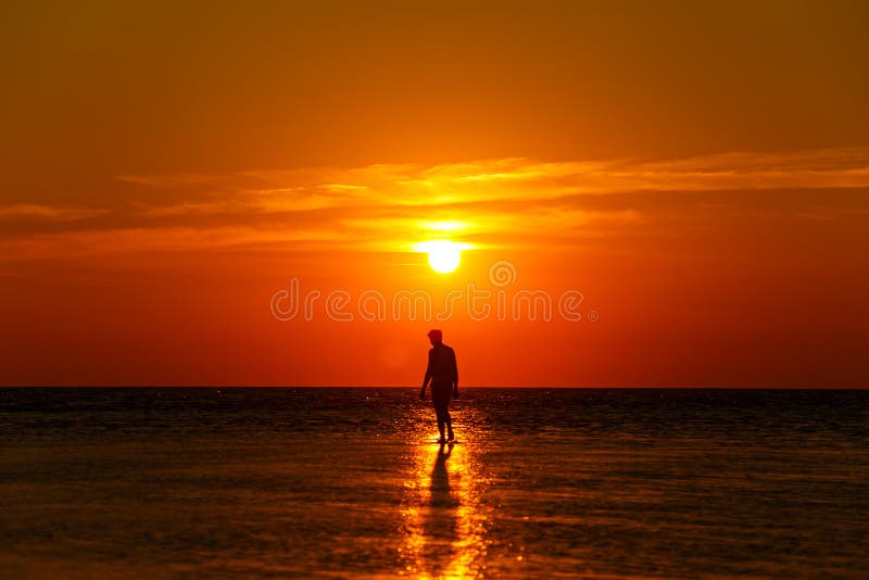 Shadow Man Sunrise Over the Sea Evening. Stock Image - Image of ...