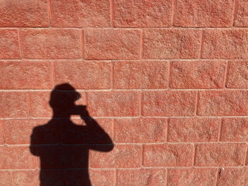 Shadow of Man Taking a Photo with Cell Phone Anonymously, Anonymous ...