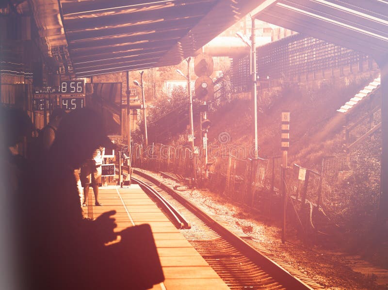 Shadow of Man on Train Station during Sunset Stock Image - Image of ...