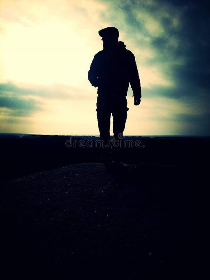 Shadow men in the sunset stock image. Image of sunset - 175616525