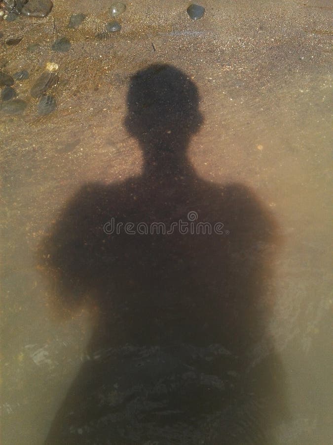 Shadow men on water river stock photo. Image of water - 228651900