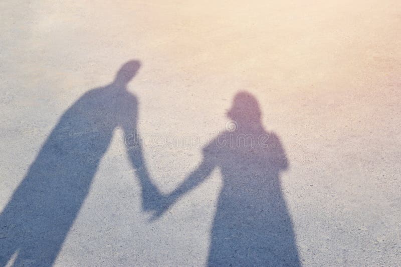 Shadow Men and Women Stand Hold Hands on a Bright Day . Stock Image ...