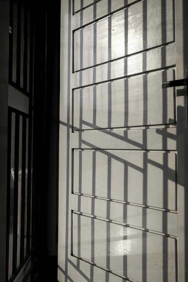 The Shadow of the Morning Sun on the Door Stock Photo - Image of copy ...