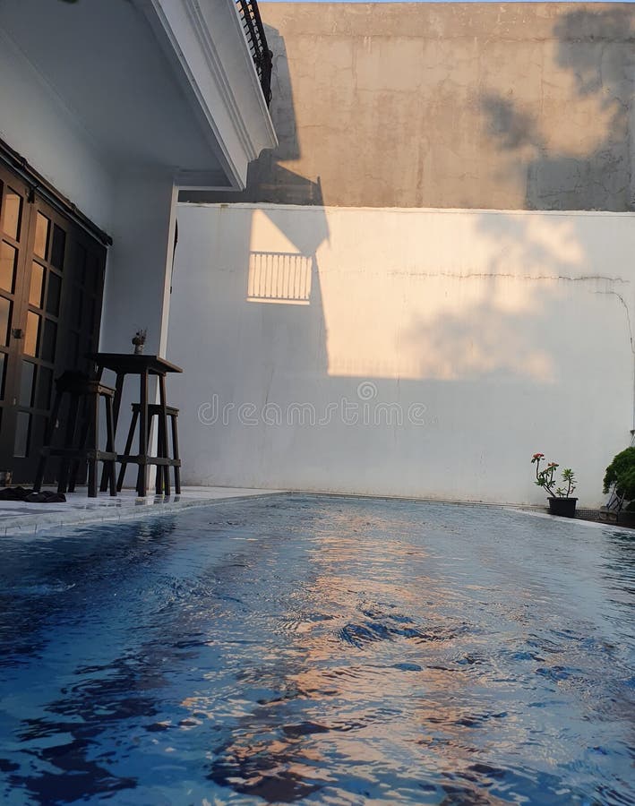 Shadow in the morning stock image. Image of swimm, deck - 263218213