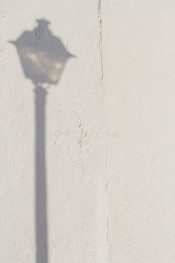 Light Post Shadow on White Wall Stock Image - Image of empty, cracked ...